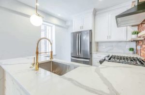 u-shaped-kitchen-with-calacatta-quartz-countertop-white-cabinets-20 ...